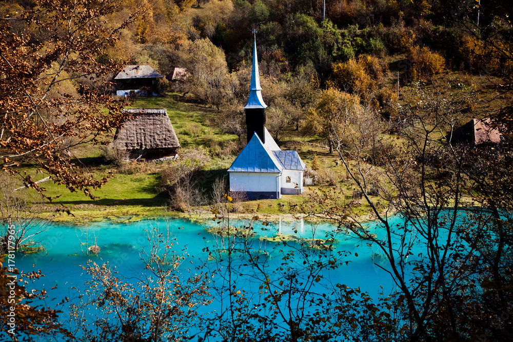 Photo & Art Print church with its cemetery under contaminated water in ...