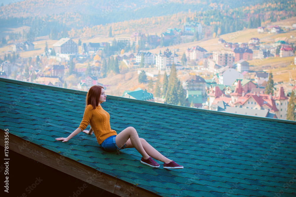 Beautiful young pretty casual fashion lady on roof top having relax ...