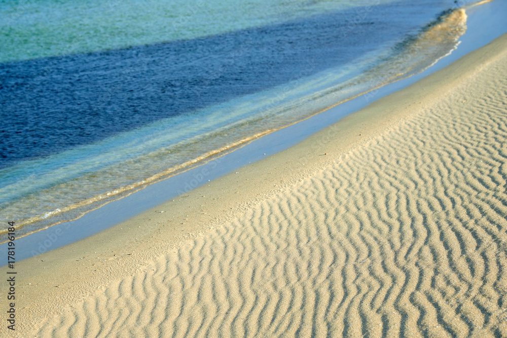 Sands on the beach A beach is a landform along a body of water. It ...