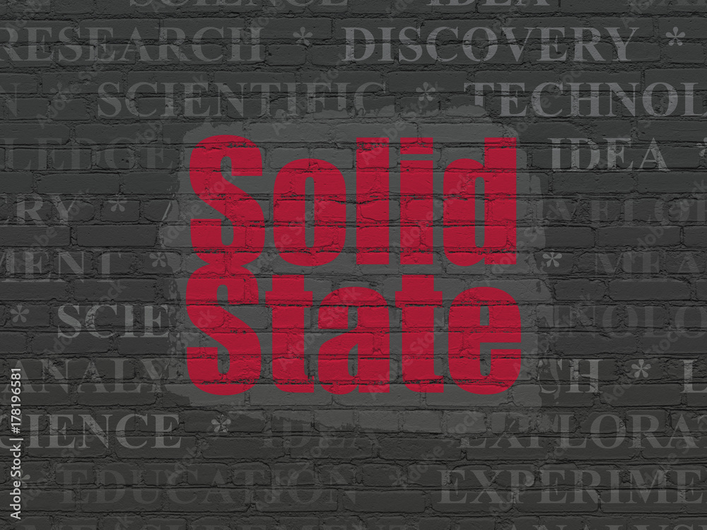 Science concept: Painted red text Solid State on Black Brick wall ...