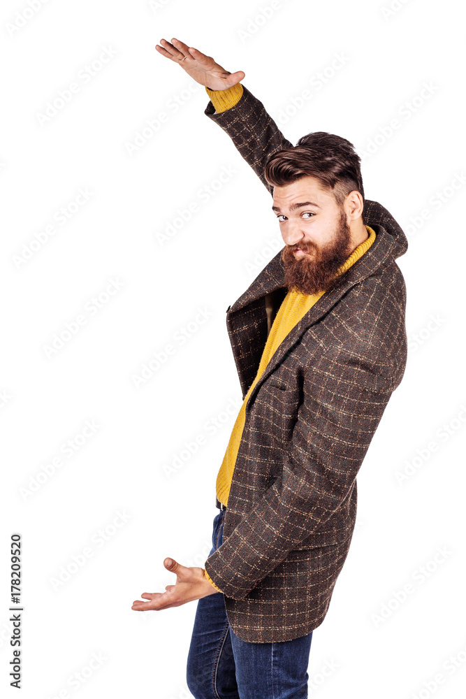 man holding two hands in front of him and shows the size. human emotion ...