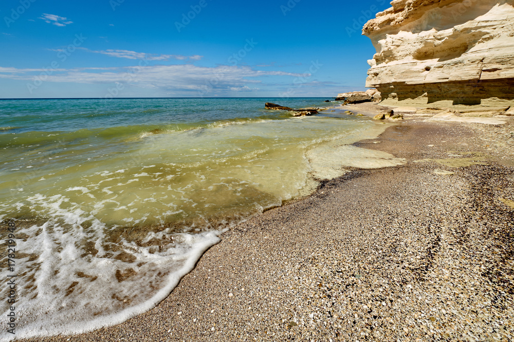On the shore of the Caspian Sea/ The Caspian Sea is the largest ...
