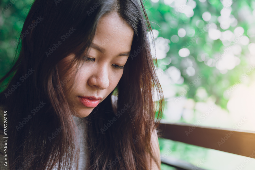 sad still mood of Asian women portrait closeup face with space for text ...