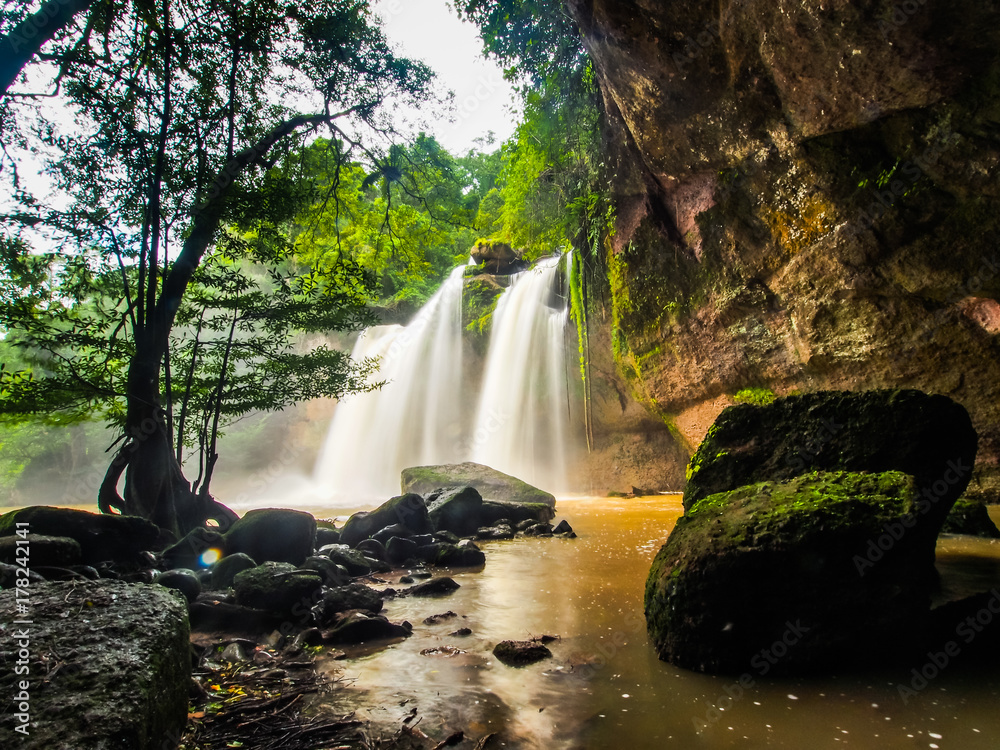 Nice waterfall flows down little hill inside Khao Yai national park of ...