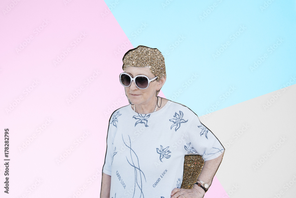 Minimalist concept of a mature woman cut out of paper and out on ...