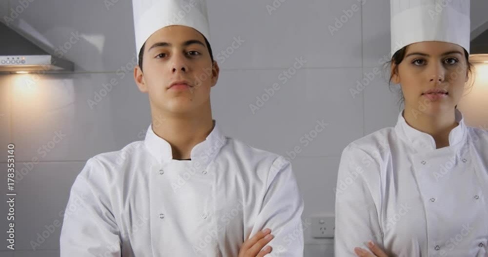Vidéo Stock Two chef cook restaurant workers in fine dining hospitality ...