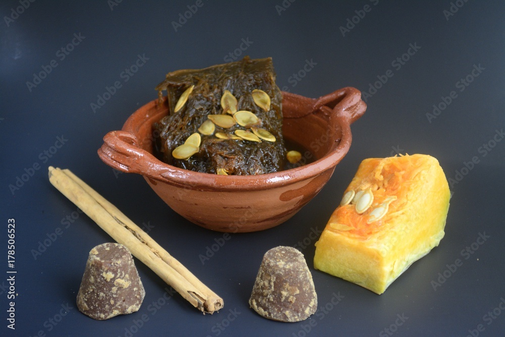 Mexican traditional pumpkin sweet made with piloncillo and cinammon on ...
