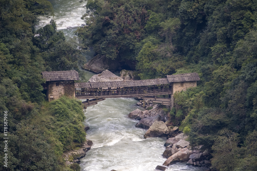 Cantilevered Bridge, Trongsa, Bhutan. This ancient bridge is hundreds ...