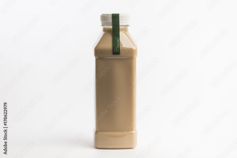 Tasty cocoa milk in plastic bottle on the white background. Organic ...
