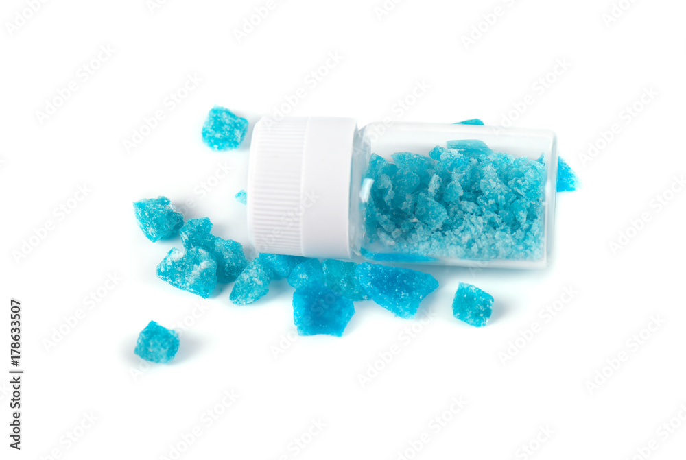 Blue crystal of methamphetamine isolated on white background. Blue ice ...