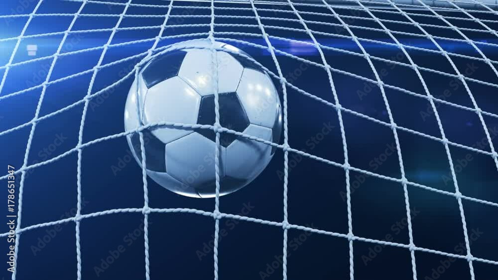 Soccer Ball flying in Goal Net in Slow Motion. Black Background and ...