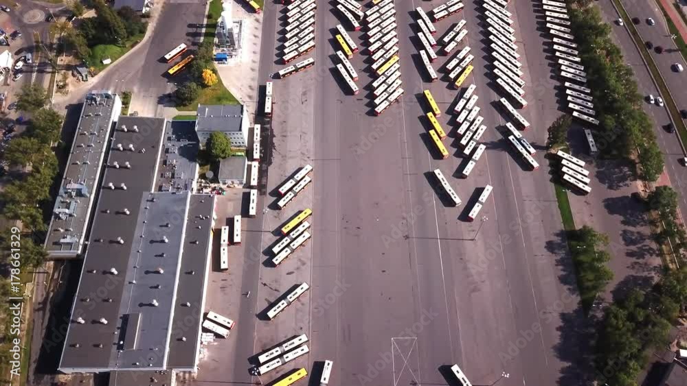 Aerial shot of Transport - bus, bus stop, bus station. Top view. Many ...