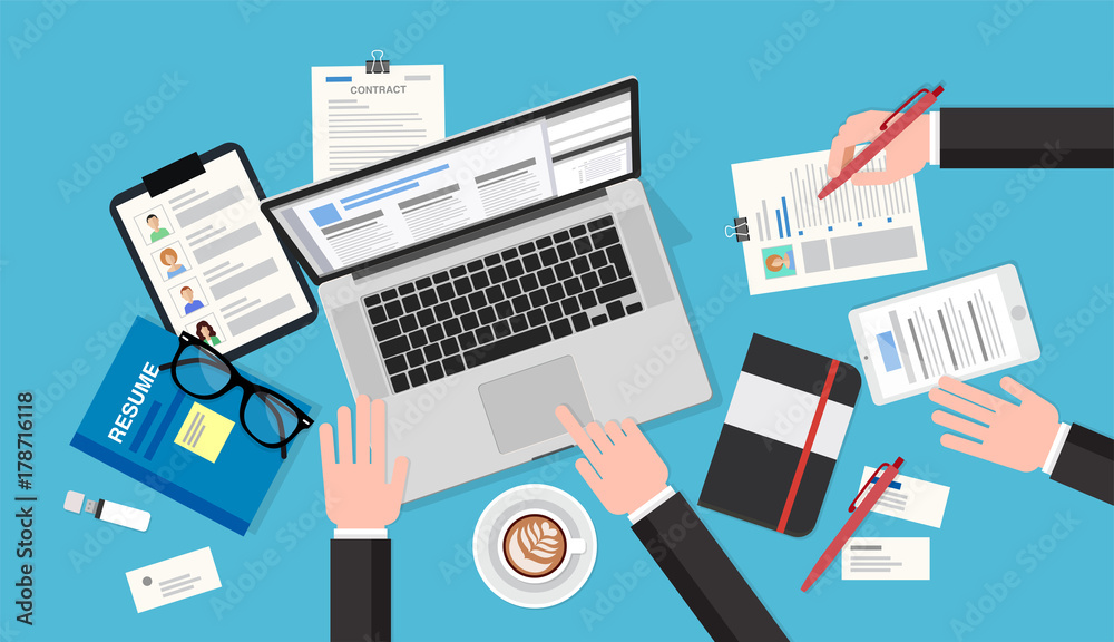 Human resources meeting, top view of a desk with a computer, notepad ...