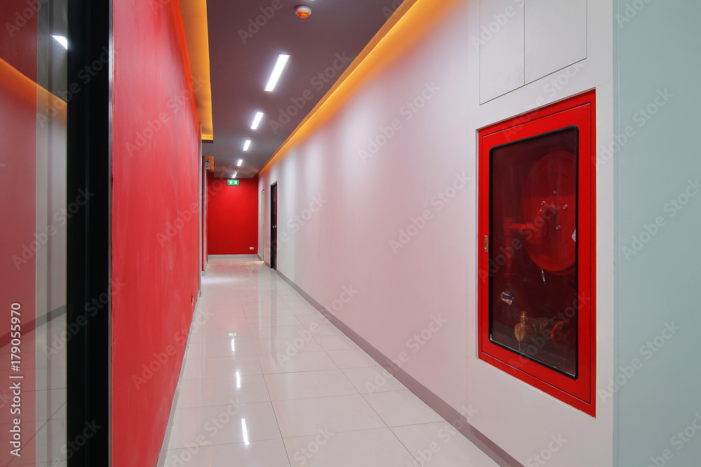 Emergency exit of the building with fire exit sign,fire alarm and Fire ...