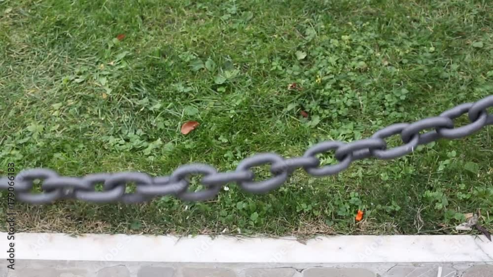 Chain fence in garden moving Stock Video | Adobe Stock