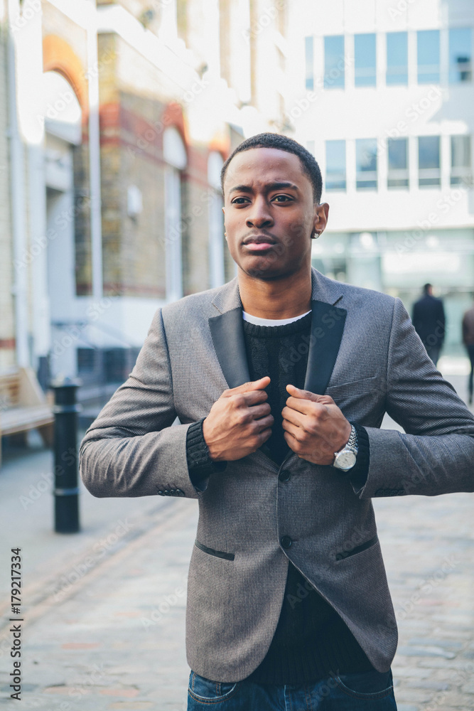 Young black man in Soho London. Stock Photo | Adobe Stock