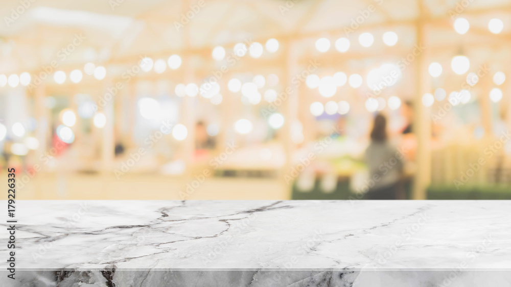 White marble Stone table top and blurred restaurant interior background ...