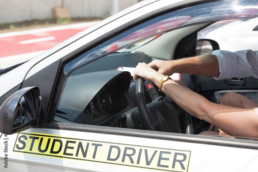 Driving school. Learning to drive a car. Stock Photo | Adobe Stock