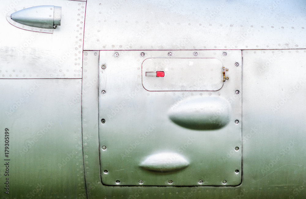 Old aircraft fuselage close up. Door handle and rivets. Stock Photo ...