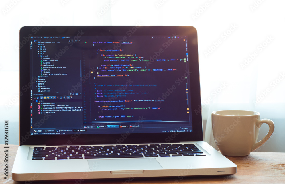 Php code on laptop (web developing) and white mug Stock Photo | Adobe Stock