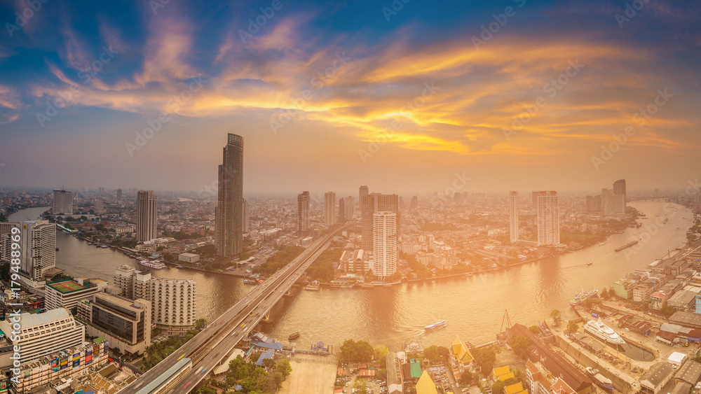 Panorama Bangkok city aerial view with river curved and sunset sky ...