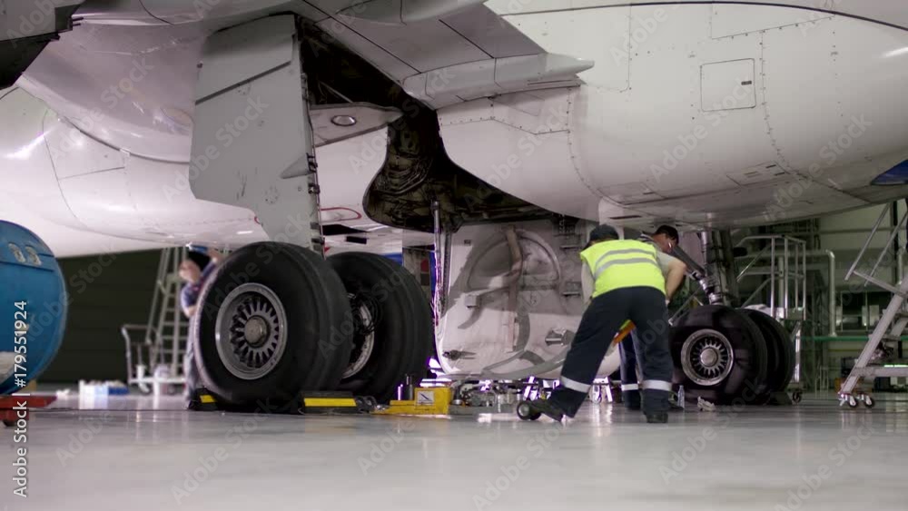 Inspection and preparing the aircraft before take off. Maintenance of ...