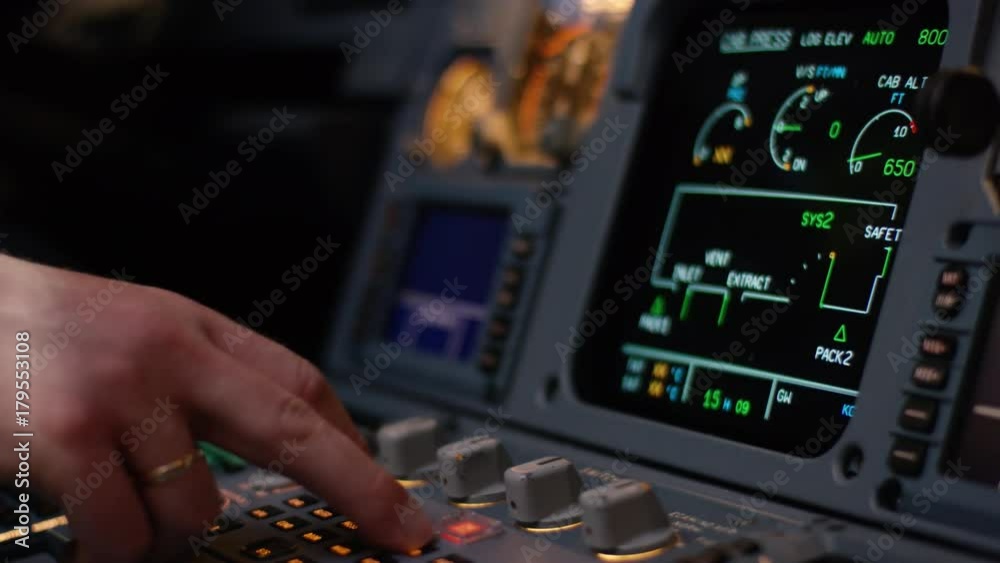 Panel of switches on an aircraft flight deck. Autopilot control element ...