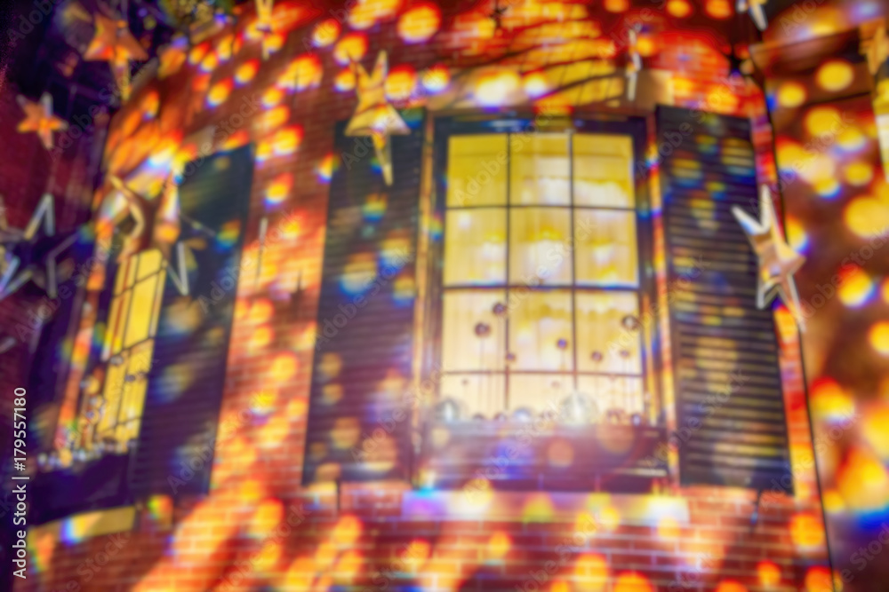 Blurred background of windows decorated with shiny stars. windows and ...
