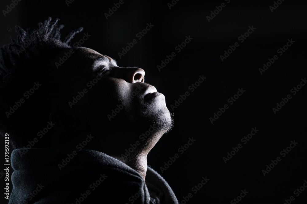 Rapper african man, black background Stock Photo | Adobe Stock