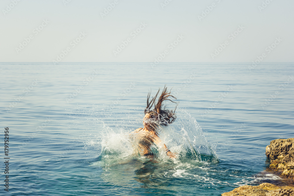 Summer Fun Lifestyle.Beautiful young girl in bikini joyfully free ...