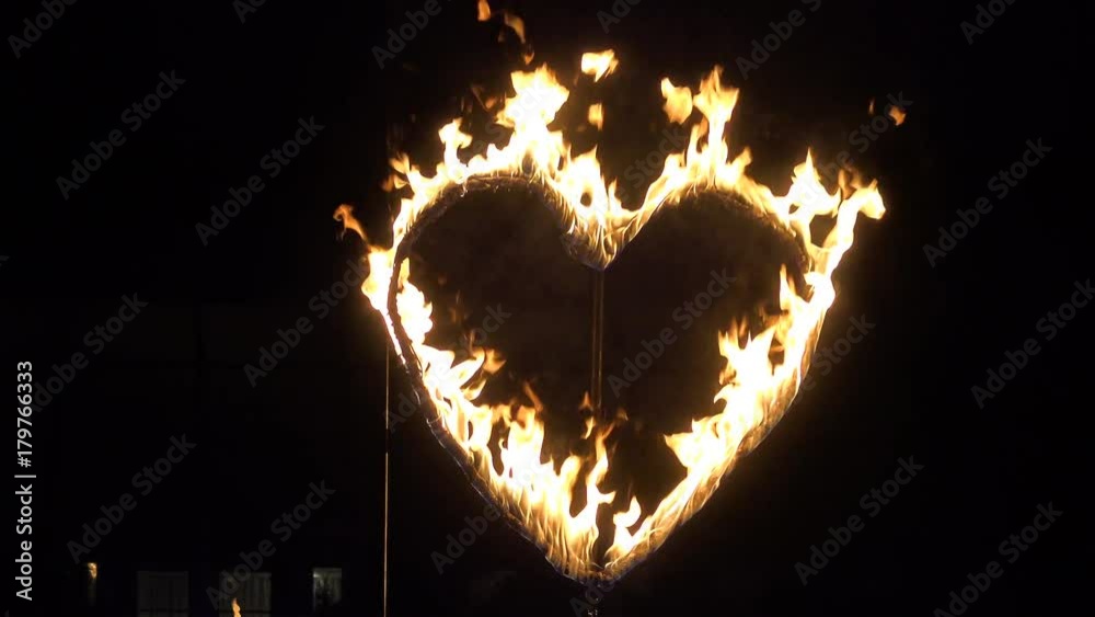 Burning heart of love. Fire show the wedding. Decorative flame - a ...