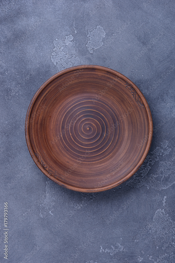 Empty plate on dark background Stock Photo | Adobe Stock