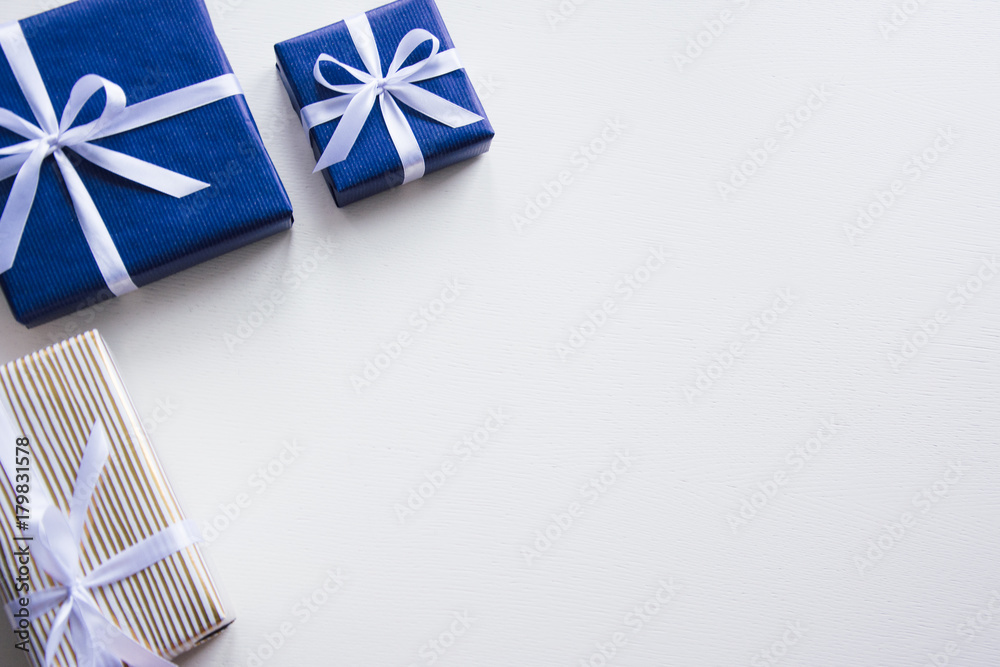 Background on a white desk decorated presents. Bright background ...