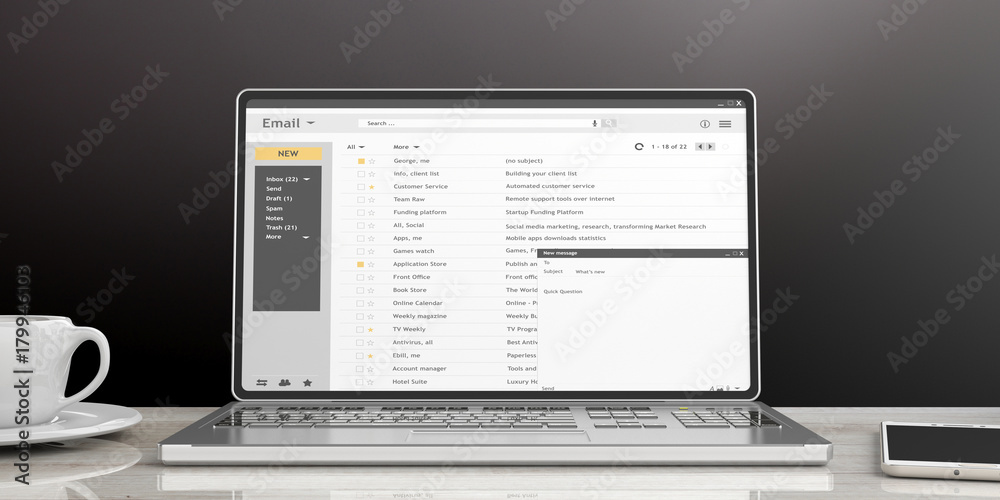 Emails on a laptop screen isolated on an office desk, black wall ...