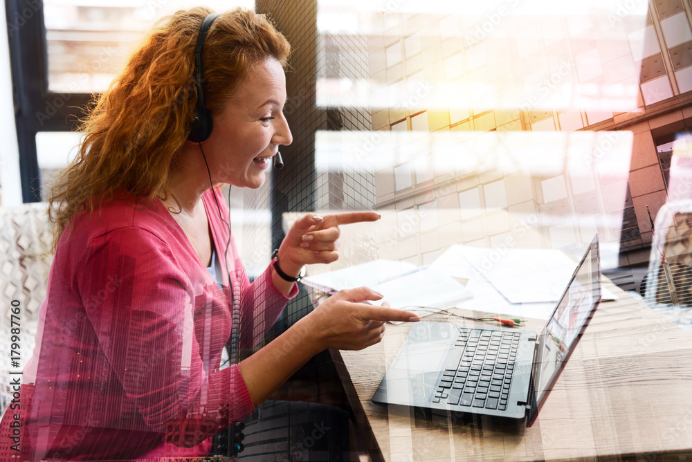 Foto de Setting positive mood. Beautiful young woman holding a video ...