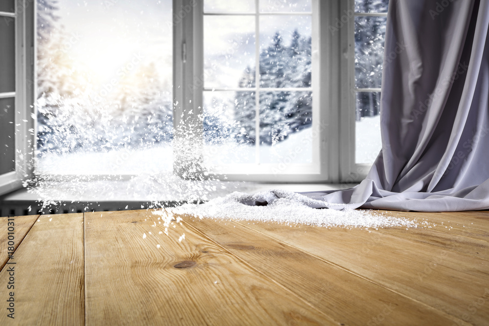 Wooden table with space for your product. Curtain in the window. Open ...