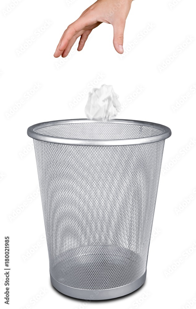 Hand throwing out paper into trash basket isolated on white Stock Photo ...