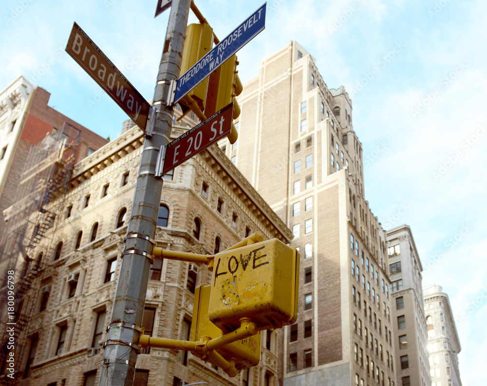 Street signs at corner of East 20th Street and Broadway Stock Photo ...