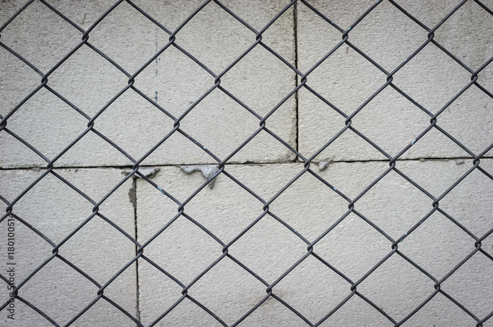 Hazard Prevention By building a metal barbed wire fence. The background ...
