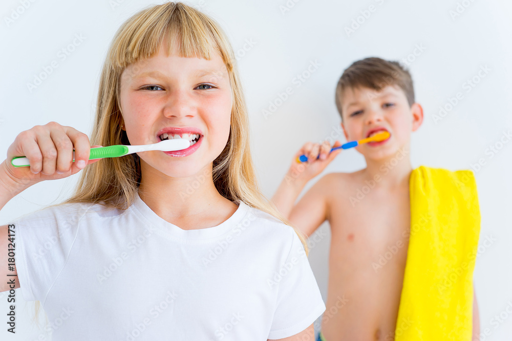 Kids brushing teeth Stock Photo | Adobe Stock