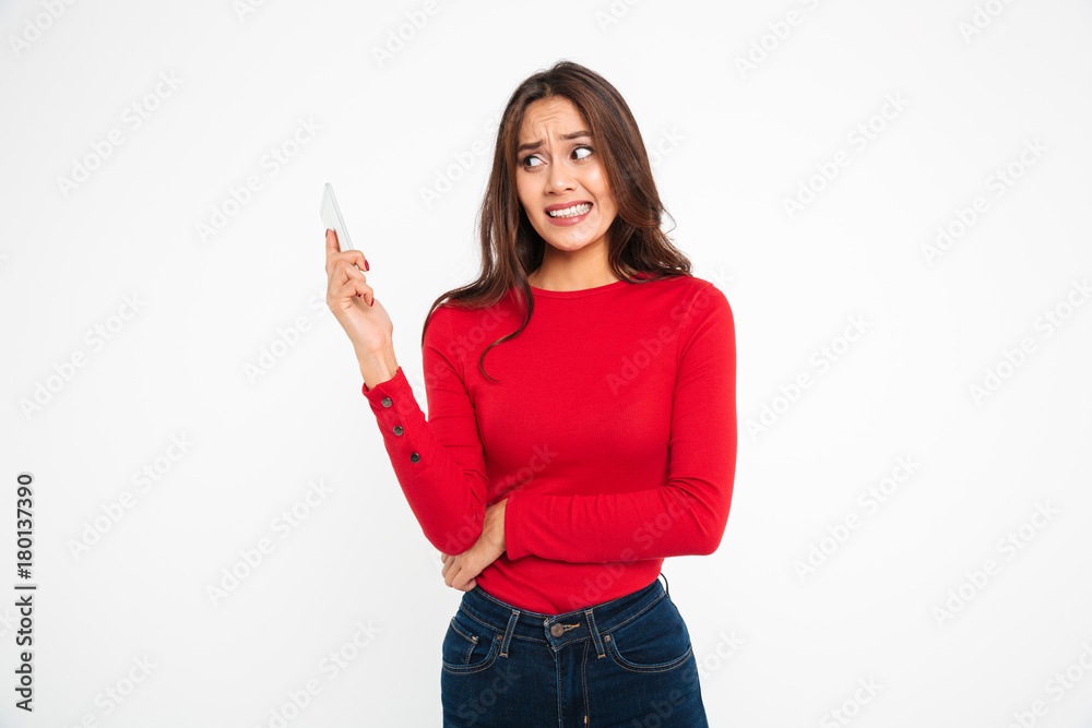 Portrait of a confused puzzled asian woman Stock Photo | Adobe Stock