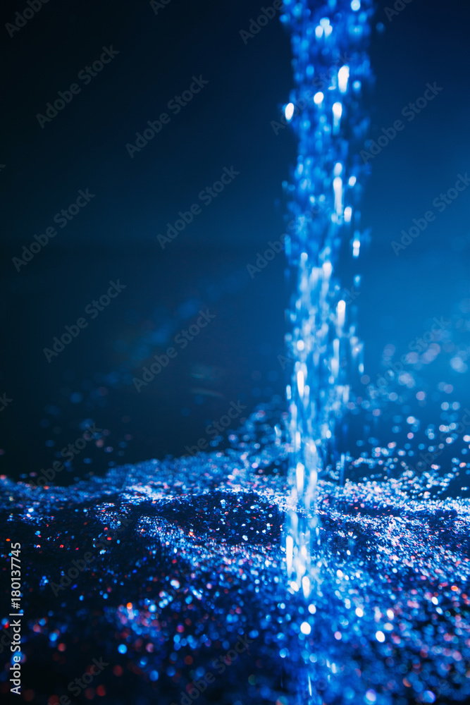 dark blue glitter background. crystal glistening waterfall concept ...