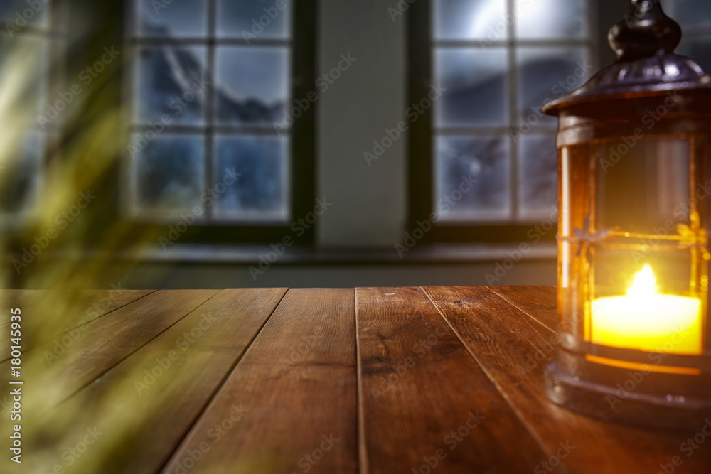 Table with space for your product or advertising tex. Candle lamp ...