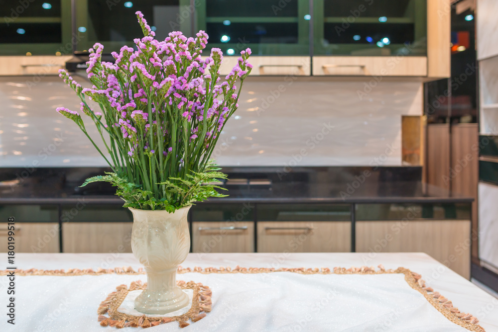 Beautiful flower in yellow ceramic vase on the dining table Stock Photo ...