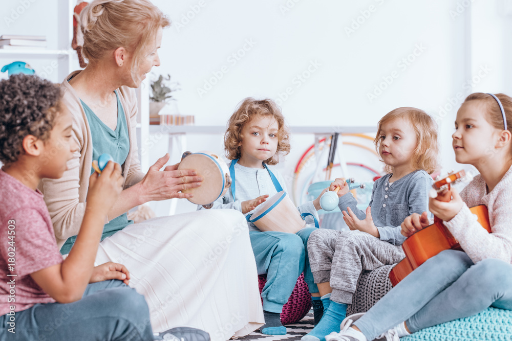 Children playing on musical instruments Stock Photo | Adobe Stock