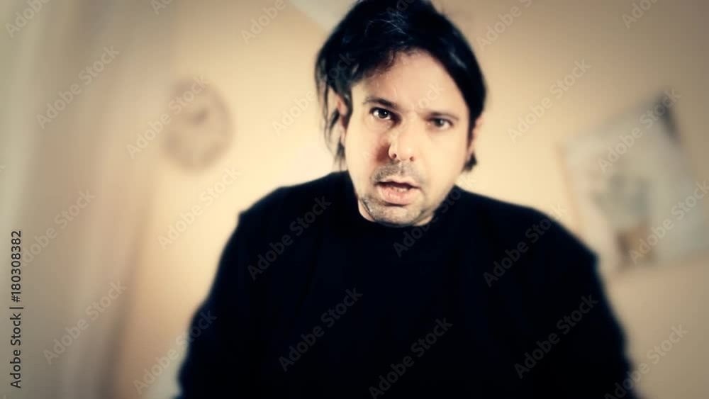 A waving nightmare of an angry upset man scolding a dog or a kid (point ...