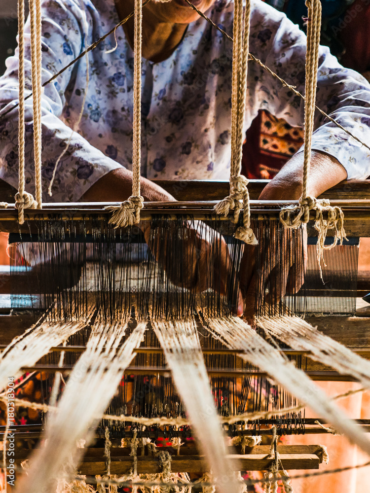 The local Intha woman weaving the lotus cloth with the hand loom at the ...