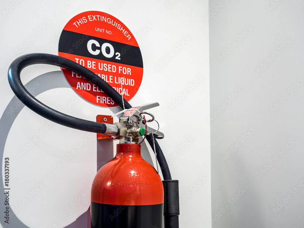 CO2 fire extinguisher and sign Stock Photo | Adobe Stock