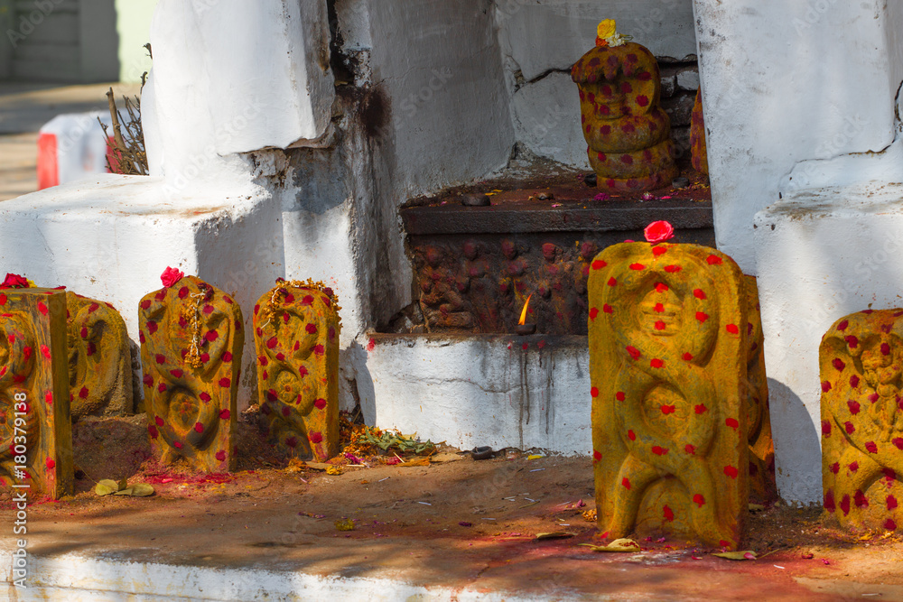 Foto de Commemorating the dead in ancient temple. Group of yellow ...