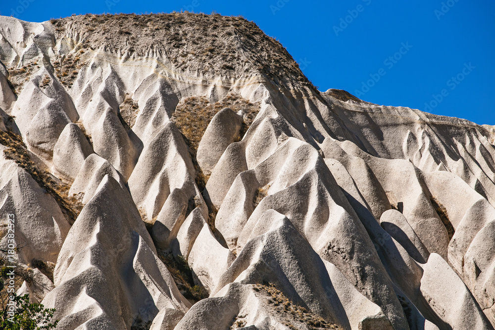Frozen volcanic tuff waves and scenic landscape of the Rose Valley in ...